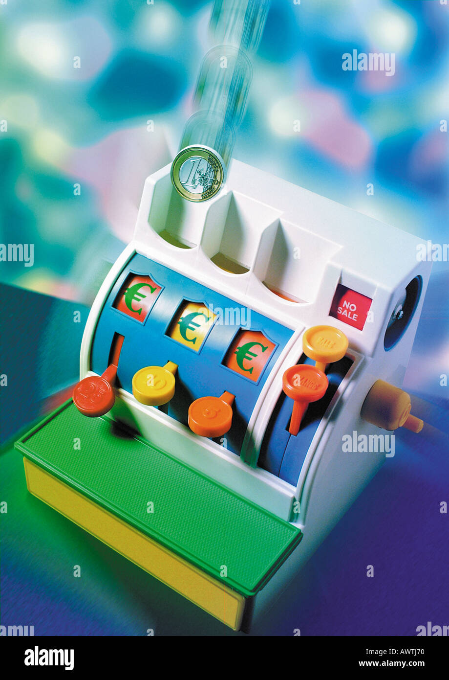 Euro signs on the wheels of a child's slot machine Stock Photo - Alamy