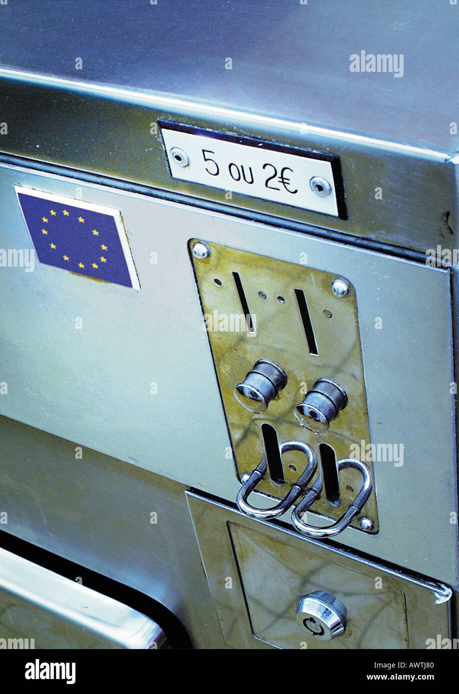 Euro sign on change slot Stock Photo - Alamy