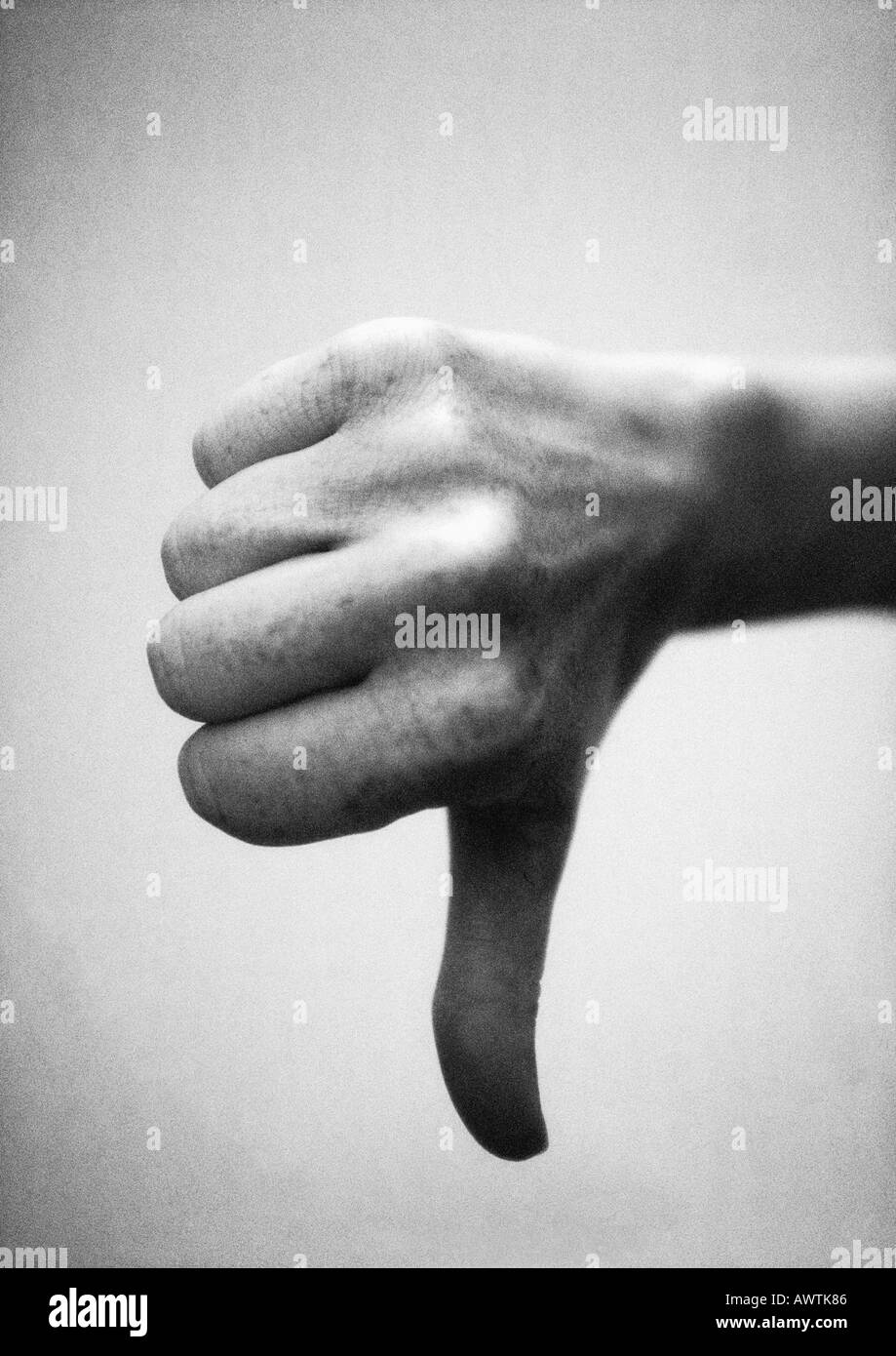 Thumbs up down neutral Black and White Stock Photos & Images - Alamy