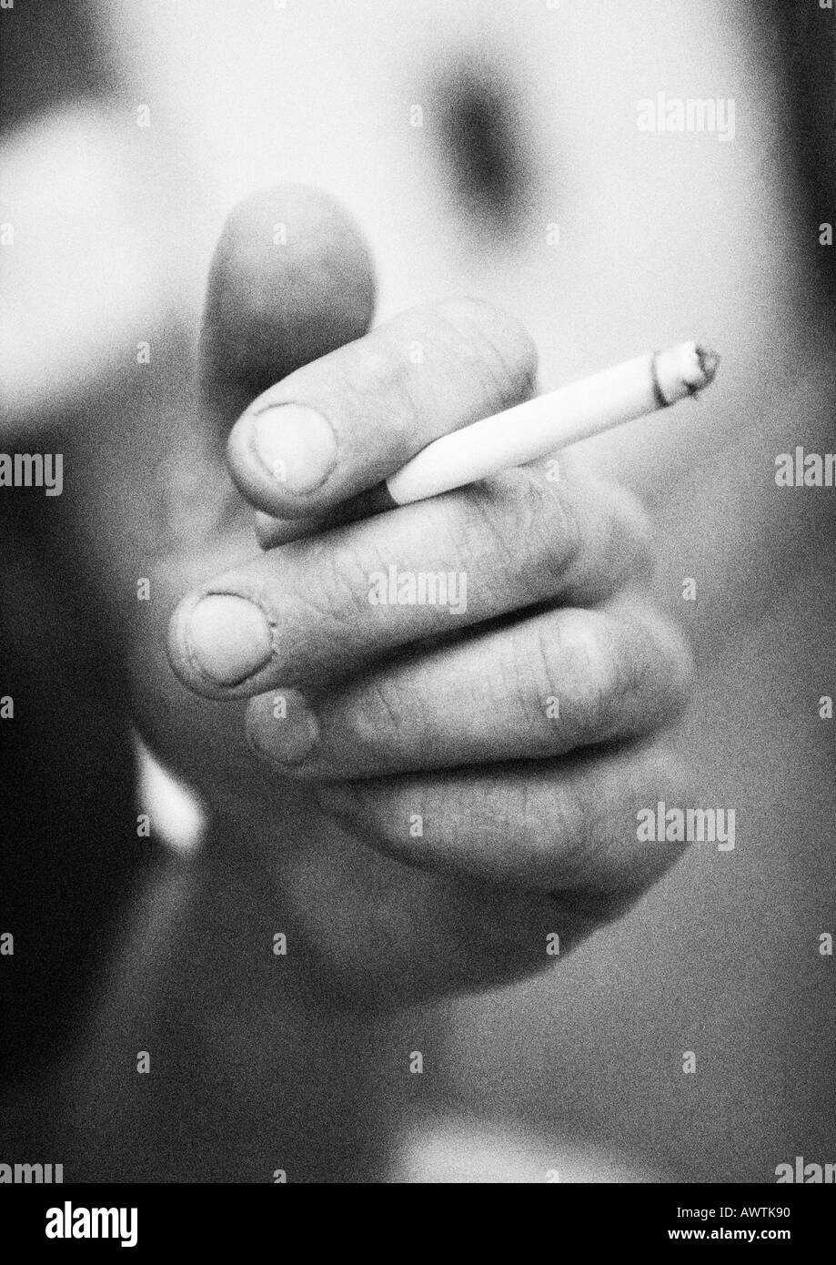 Close up on cigarette Black and White Stock Photos & Images - Alamy