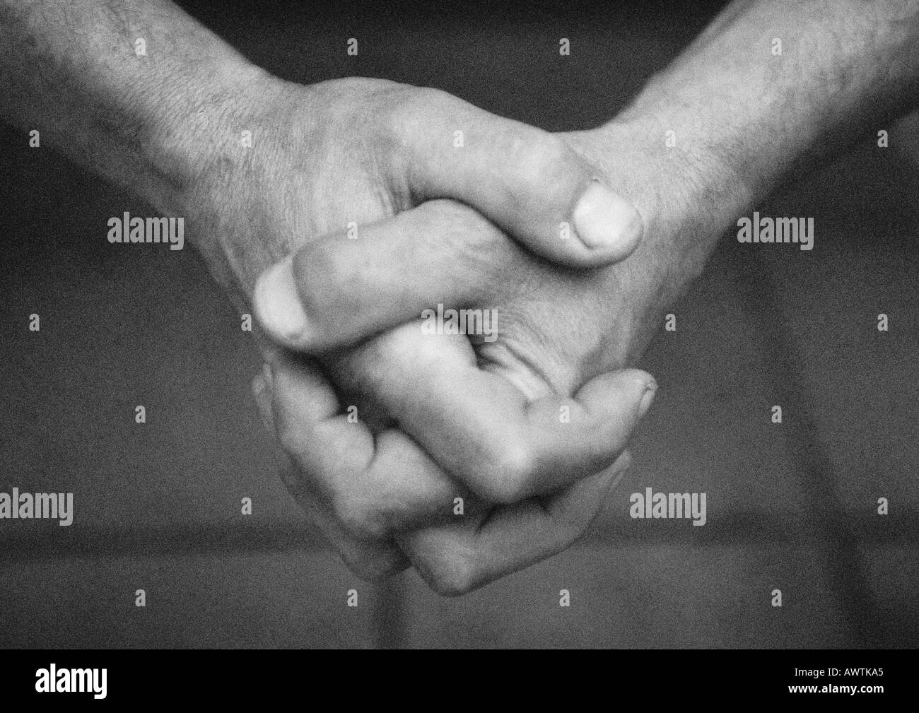 Hands together, close-up, b&w Stock Photo - Alamy