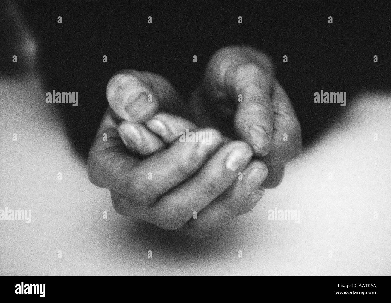 Hands cupped, close-up, b&w Stock Photo - Alamy