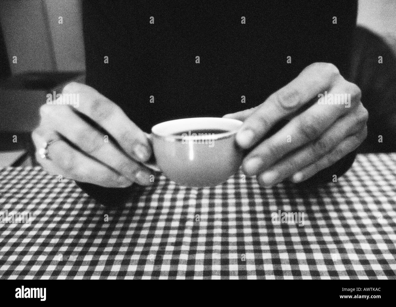 Hand holding cup Black and White Stock Photos & Images - Alamy