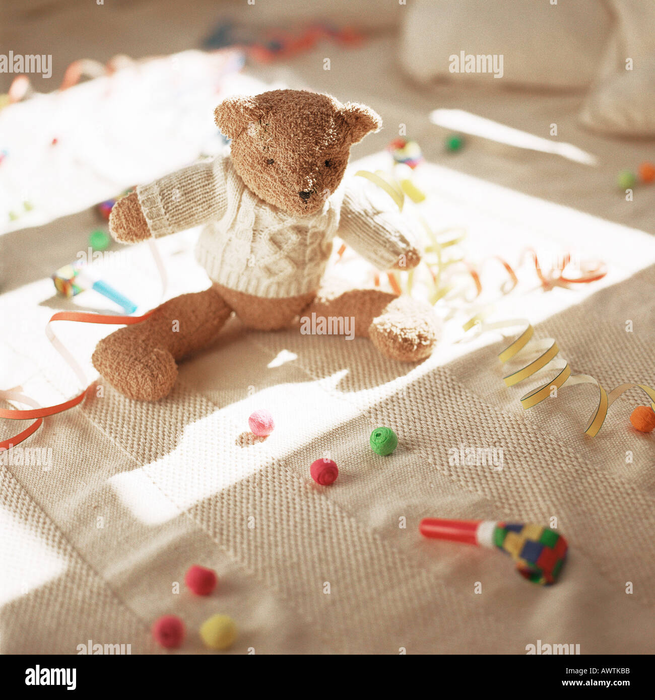 Single teddy bear on a floor in a child room Stock Photo - Alamy