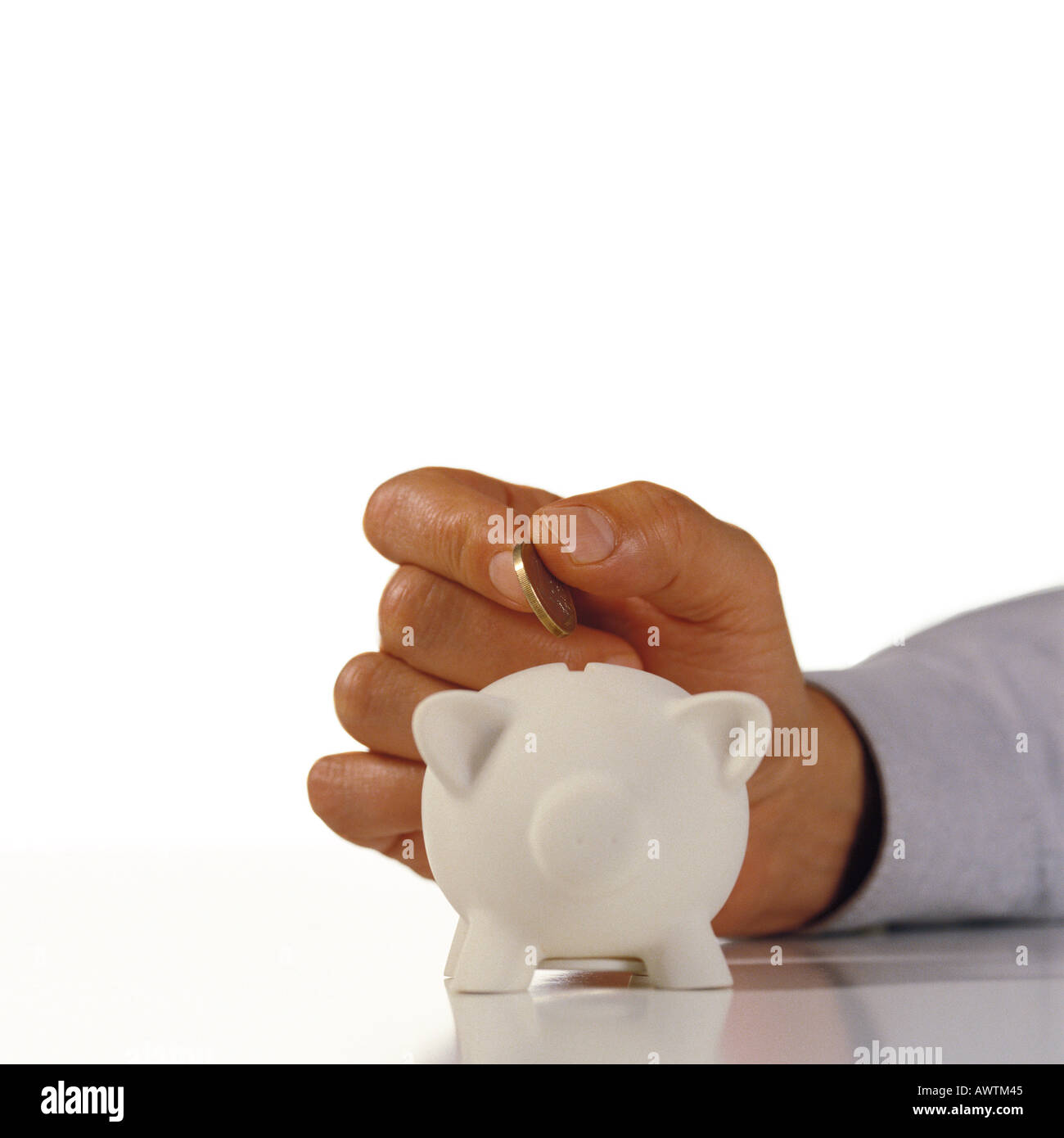 Hands dropping coins hi-res stock photography and images - Alamy