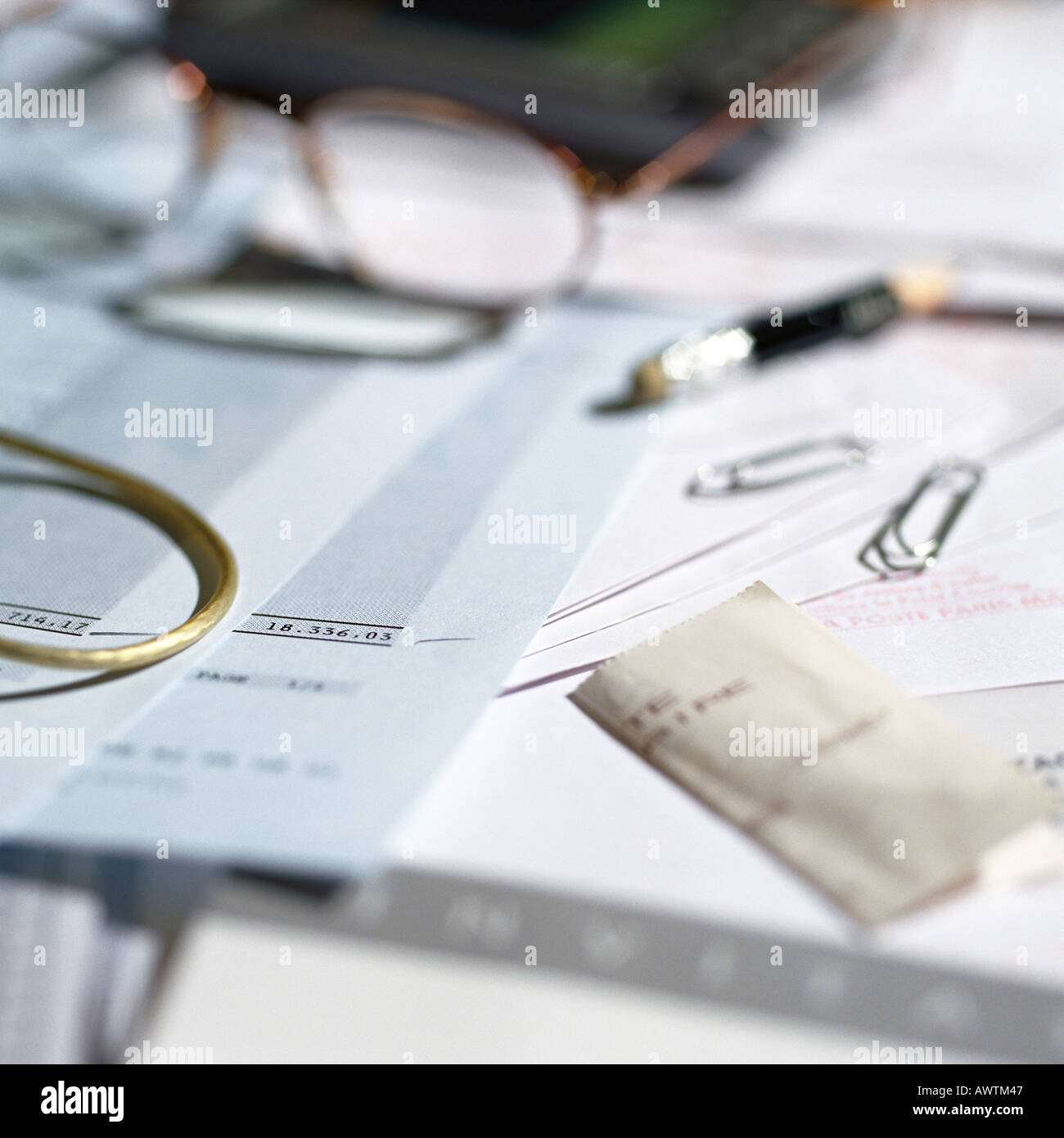 Paperwork, glasses and office materials lying on desk Stock Photo - Alamy