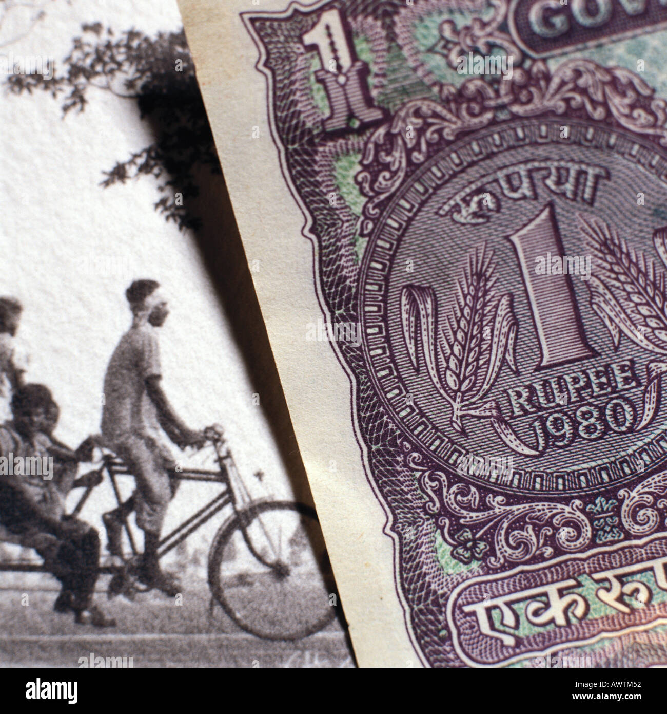 Paper bill next to old photograph Stock Photo - Alamy