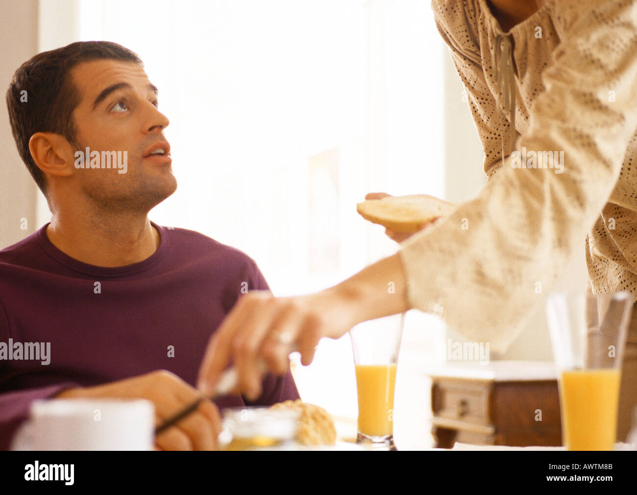 Person buttering toast hi-res stock photography and images - Alamy