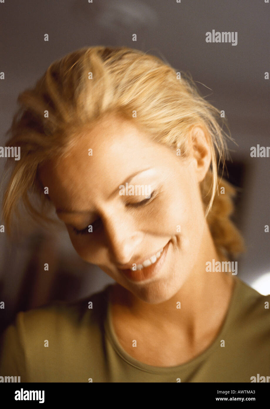 Head tilted down hi-res stock photography and images - Alamy