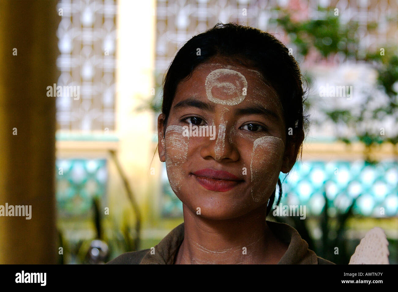 Young woman wearing thanaka makeup Stock Photo - Alamy