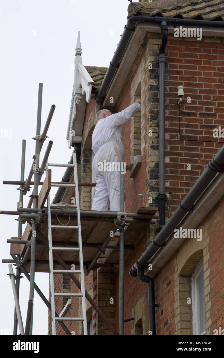 Man Working On Scaffolding Stock Photo - Alamy