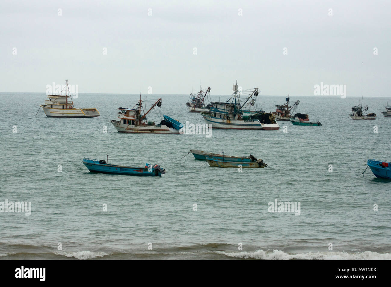 Fishing boats Puerto Lopez fishing Harbour Ecuador South America Stock ...