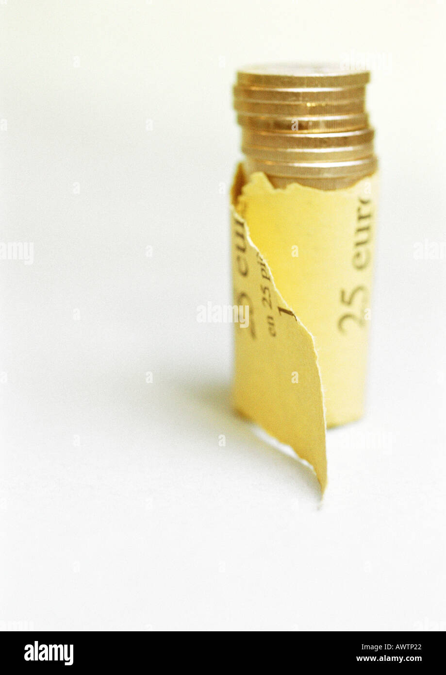 Open paper roll of euro coins Stock Photo - Alamy