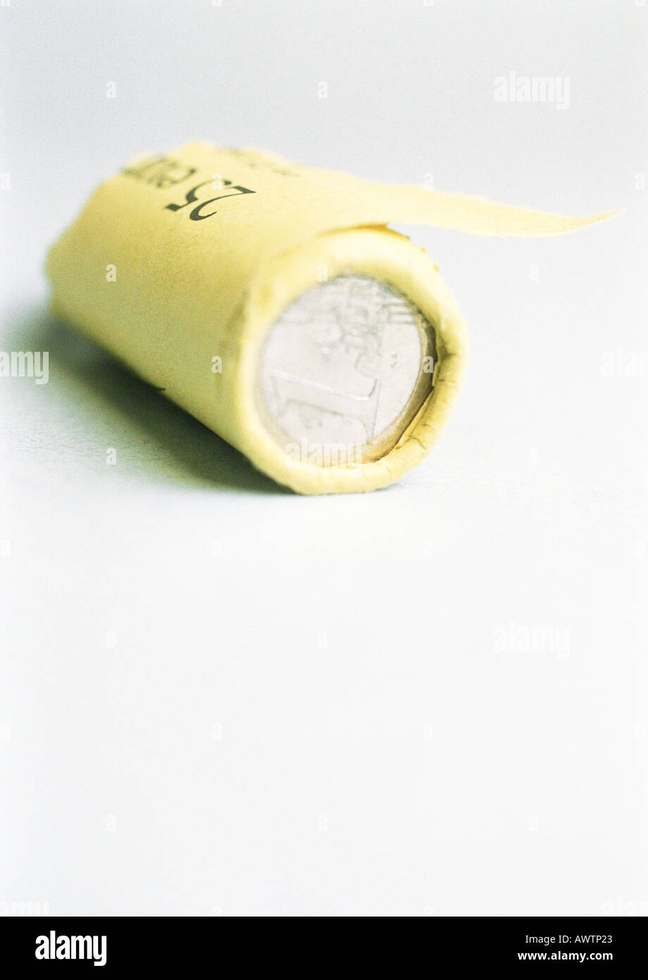 Paper roll of euro coins Stock Photo - Alamy