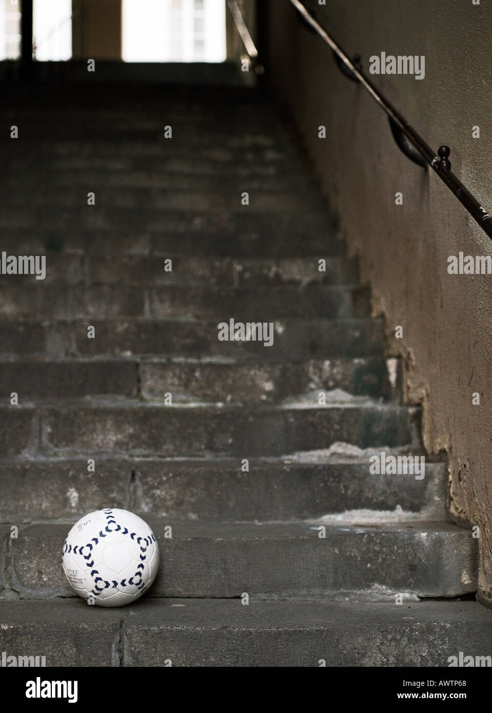 Soccer ball on steps Stock Photo - Alamy