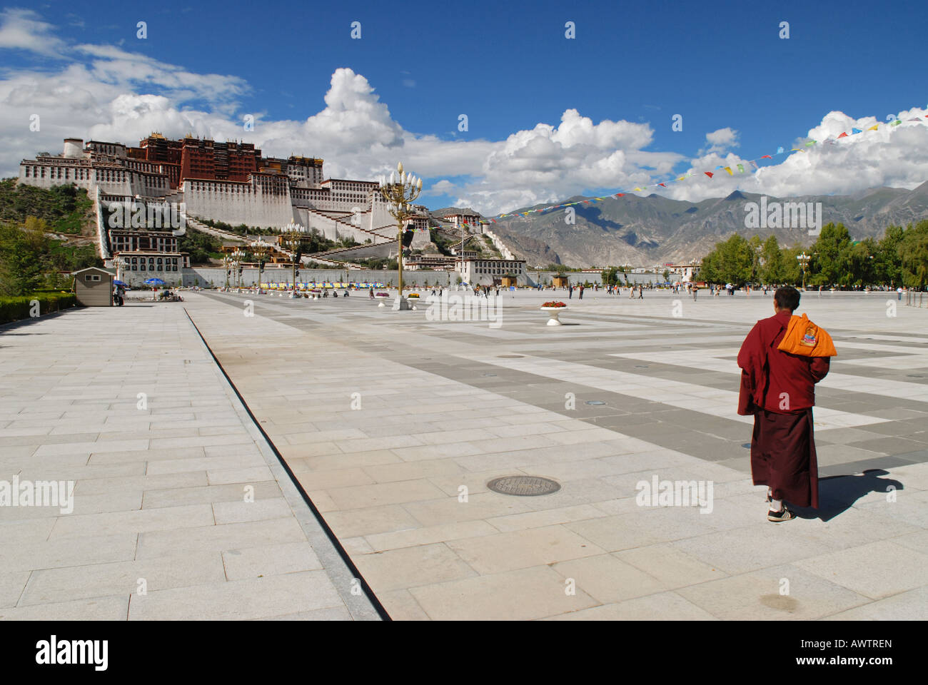 Monk in front of the Potala Palace in Lhasa, Tibet Stock Photo - Alamy