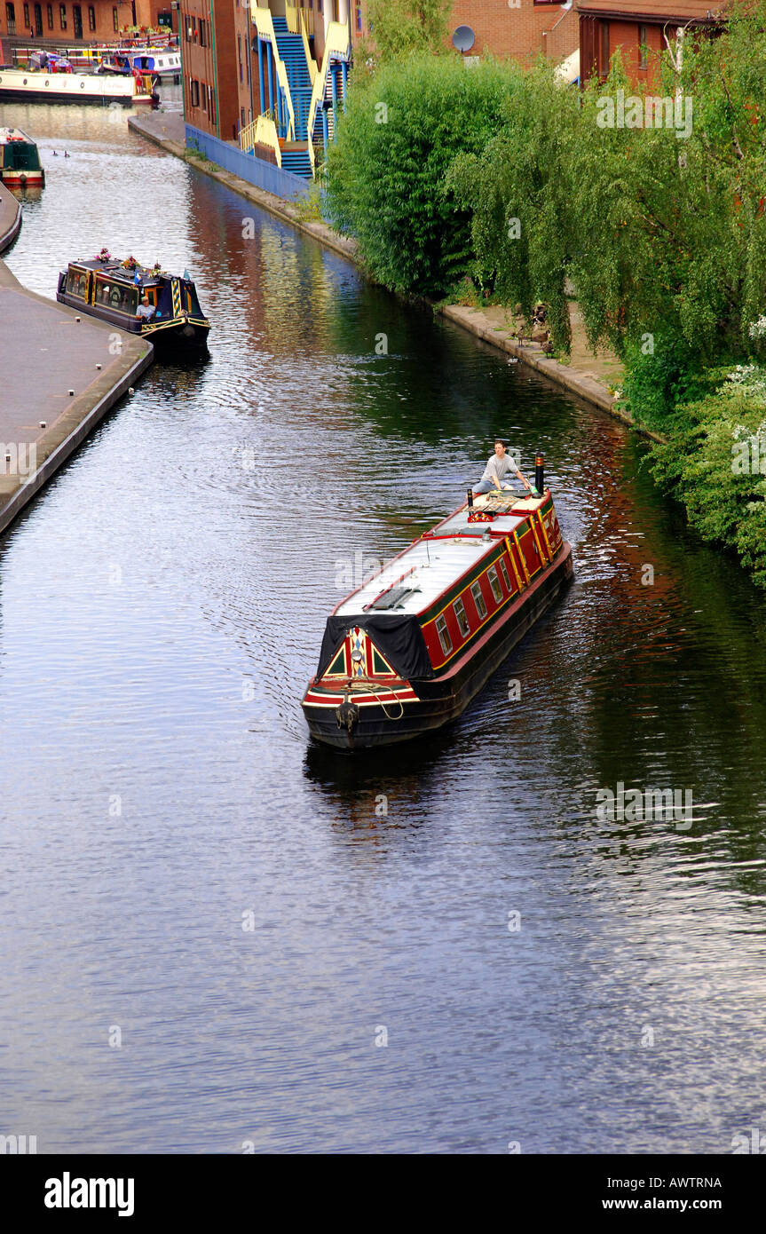 Narrow boat on Birmingham Canal at Brindley Place, City Centre ...