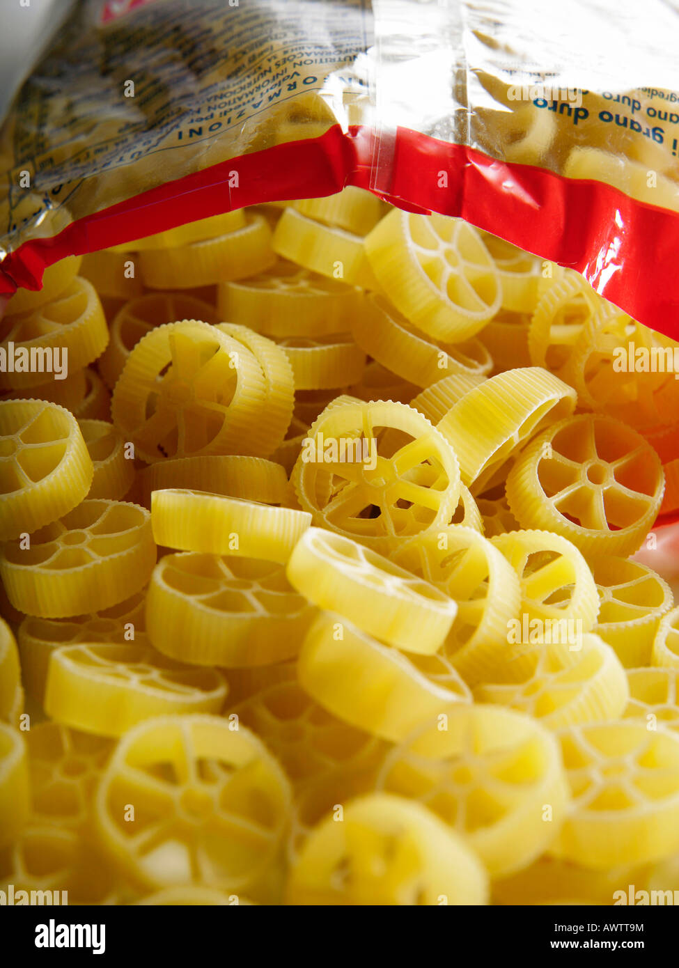 Wagon wheel pasta Stock Photo - Alamy