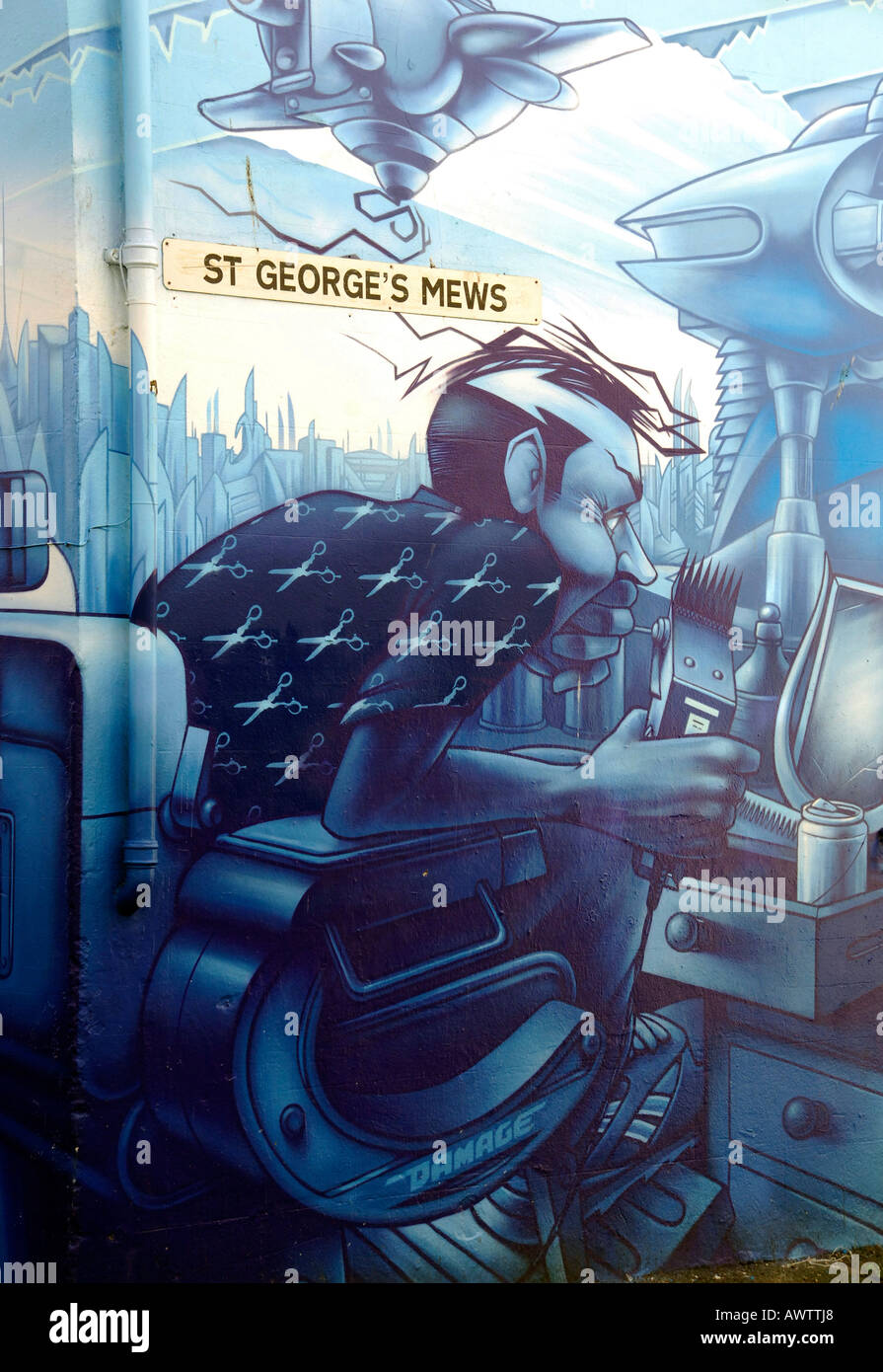 Blue wall mural of man playing computer game - St Georges Mews ...