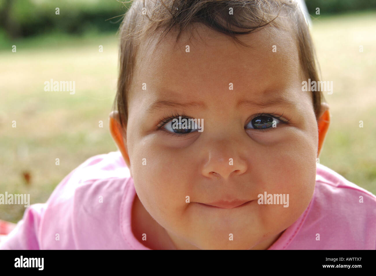 Baby girl in pink Stock Photo - Alamy