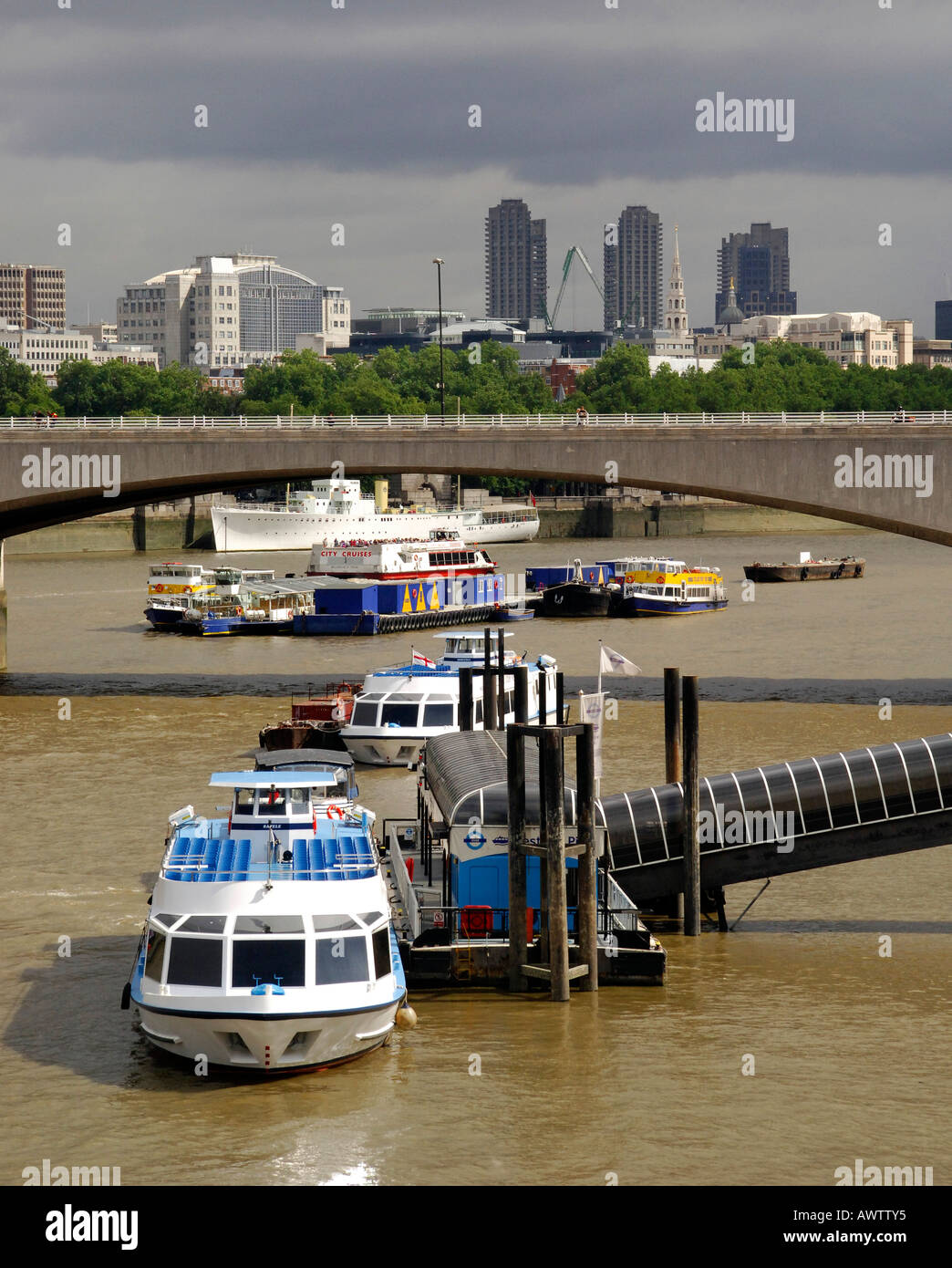 Passenger cruise ship on the River Thames looking towards Waterloo ...
