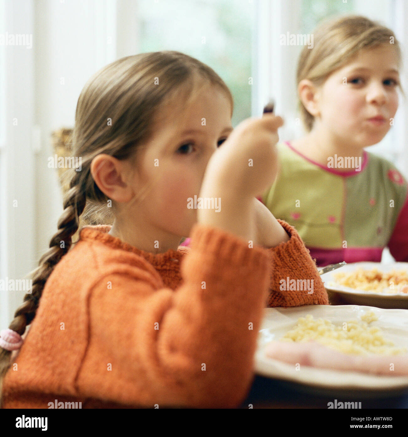 Children eats lunch tables hi-res stock photography and images - Alamy