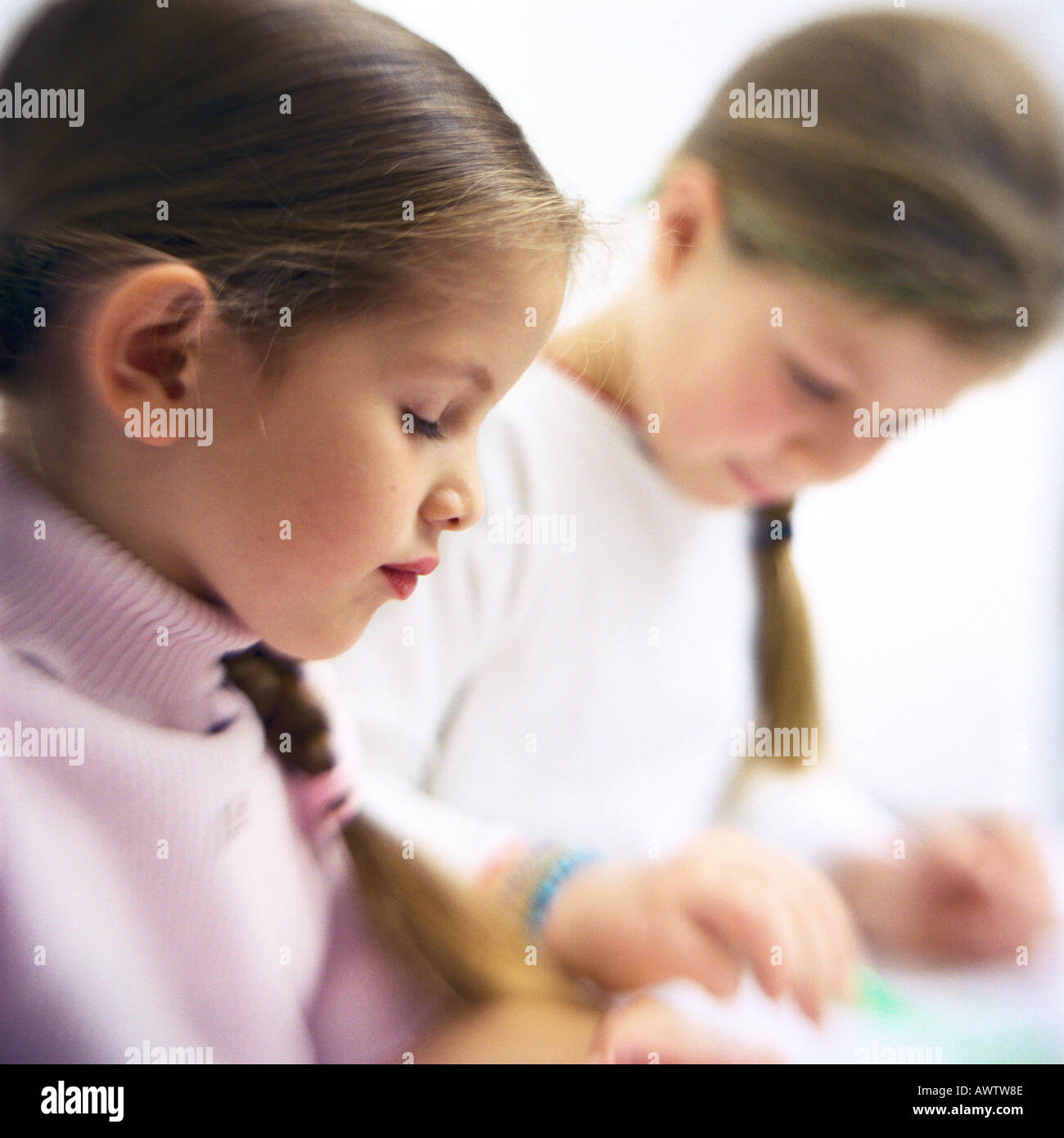 Two children heads cut out hi-res stock photography and images - Alamy
