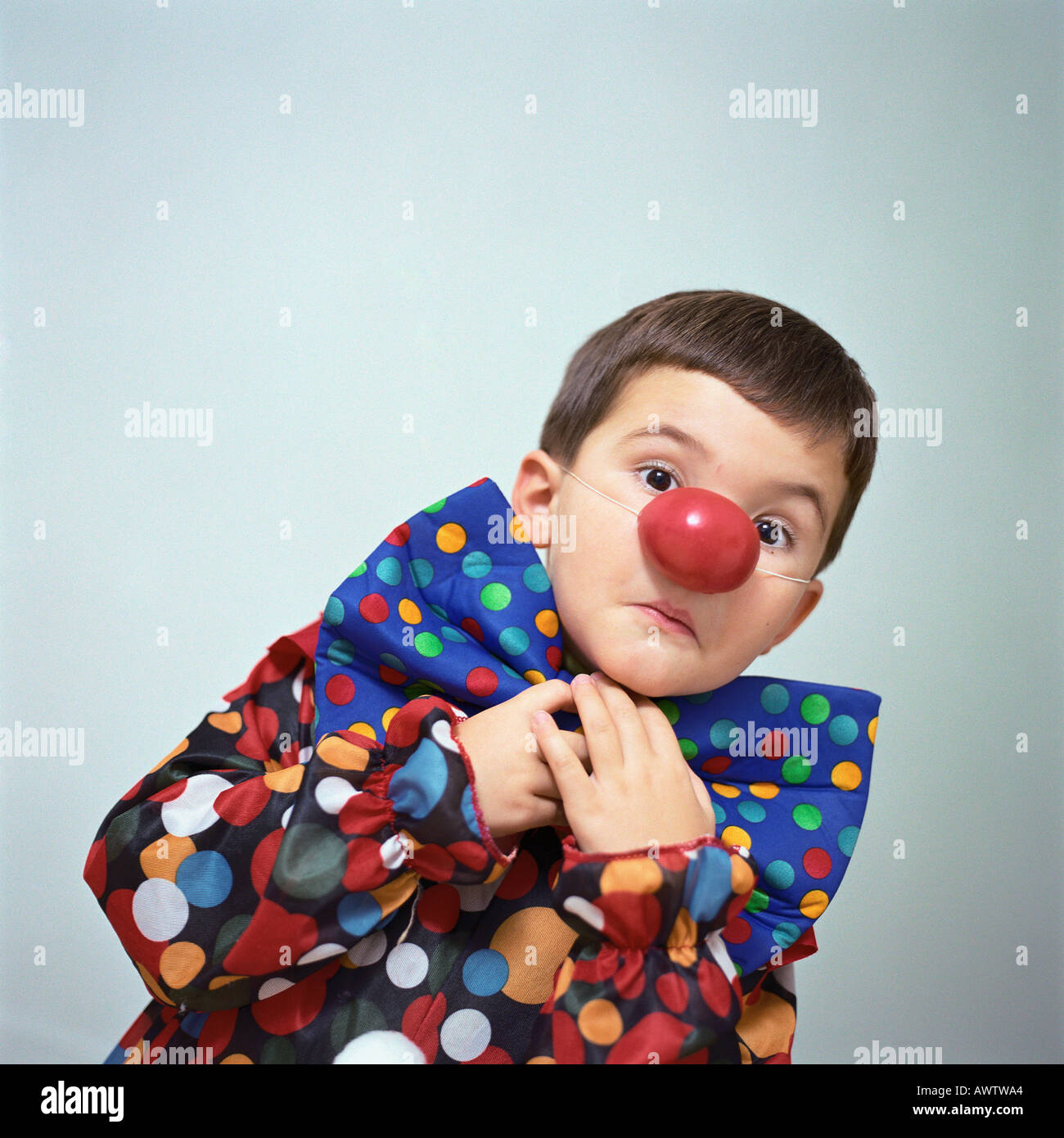 Boy dressed up as clown Stock Photo - Alamy