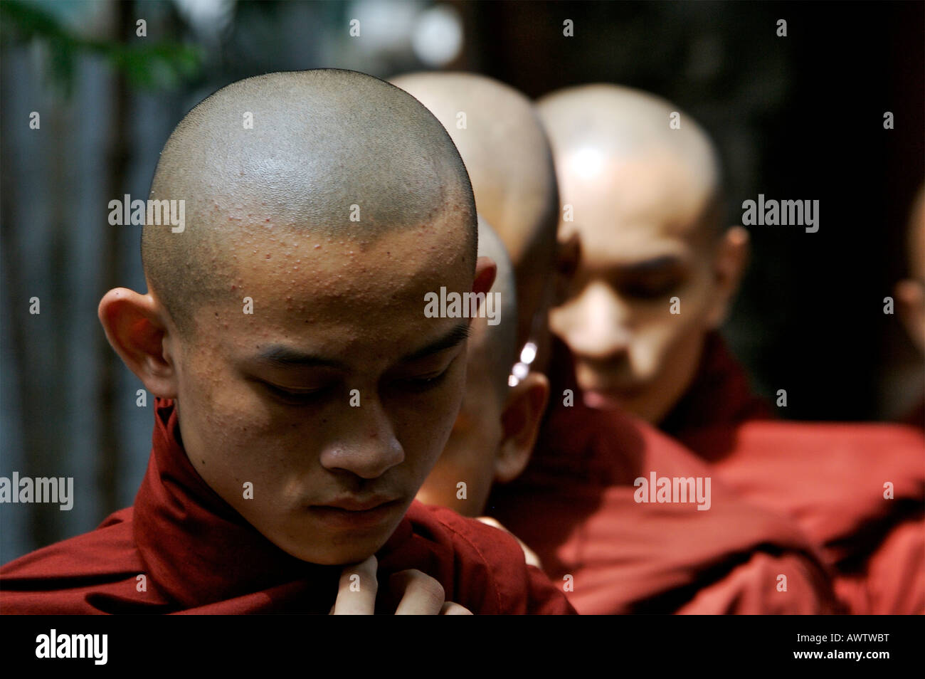 Monks queueing for second meal Mahagandayon monastery Stock Photo - Alamy