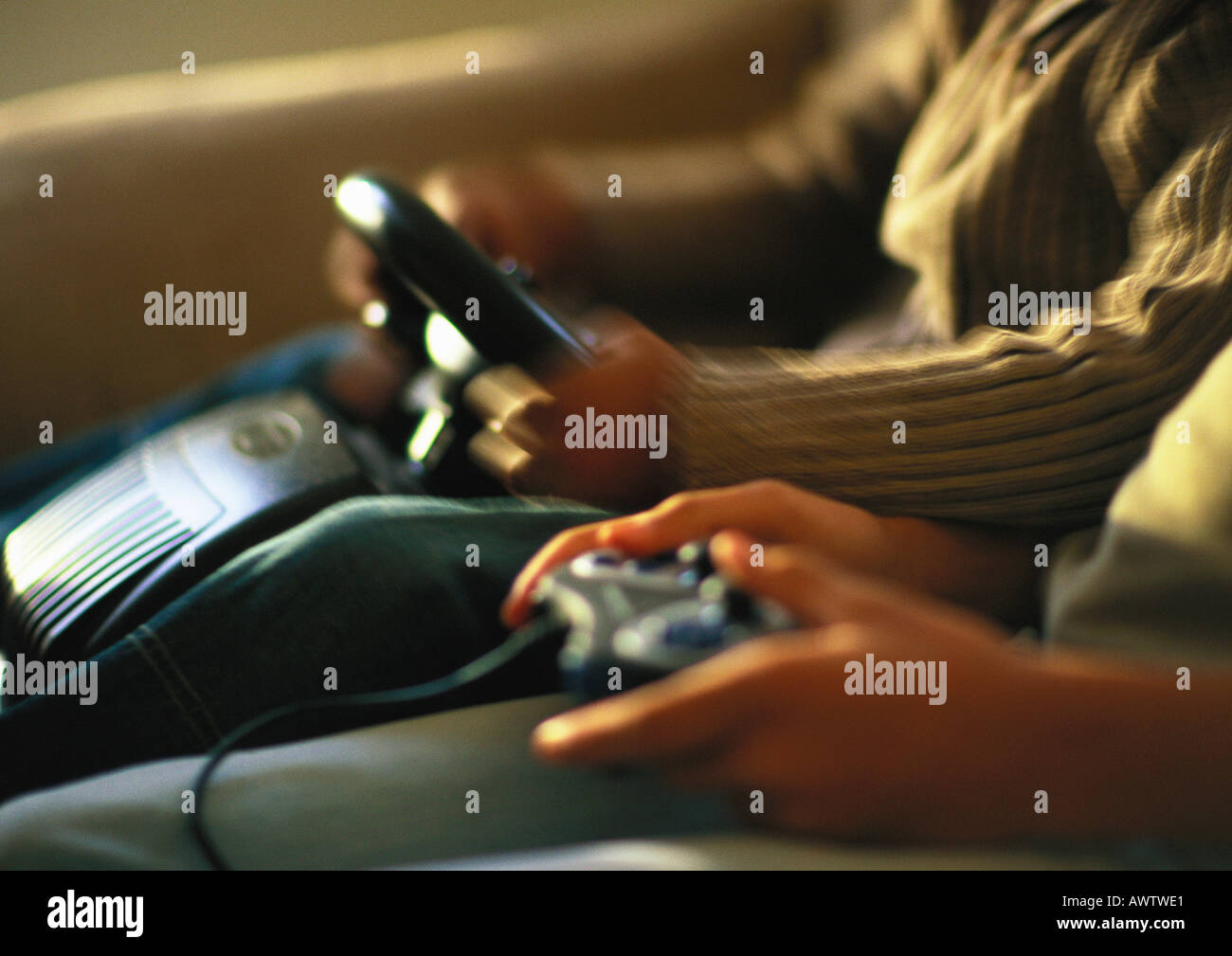 Hands of children playing video game, close up Stock Photo - Alamy