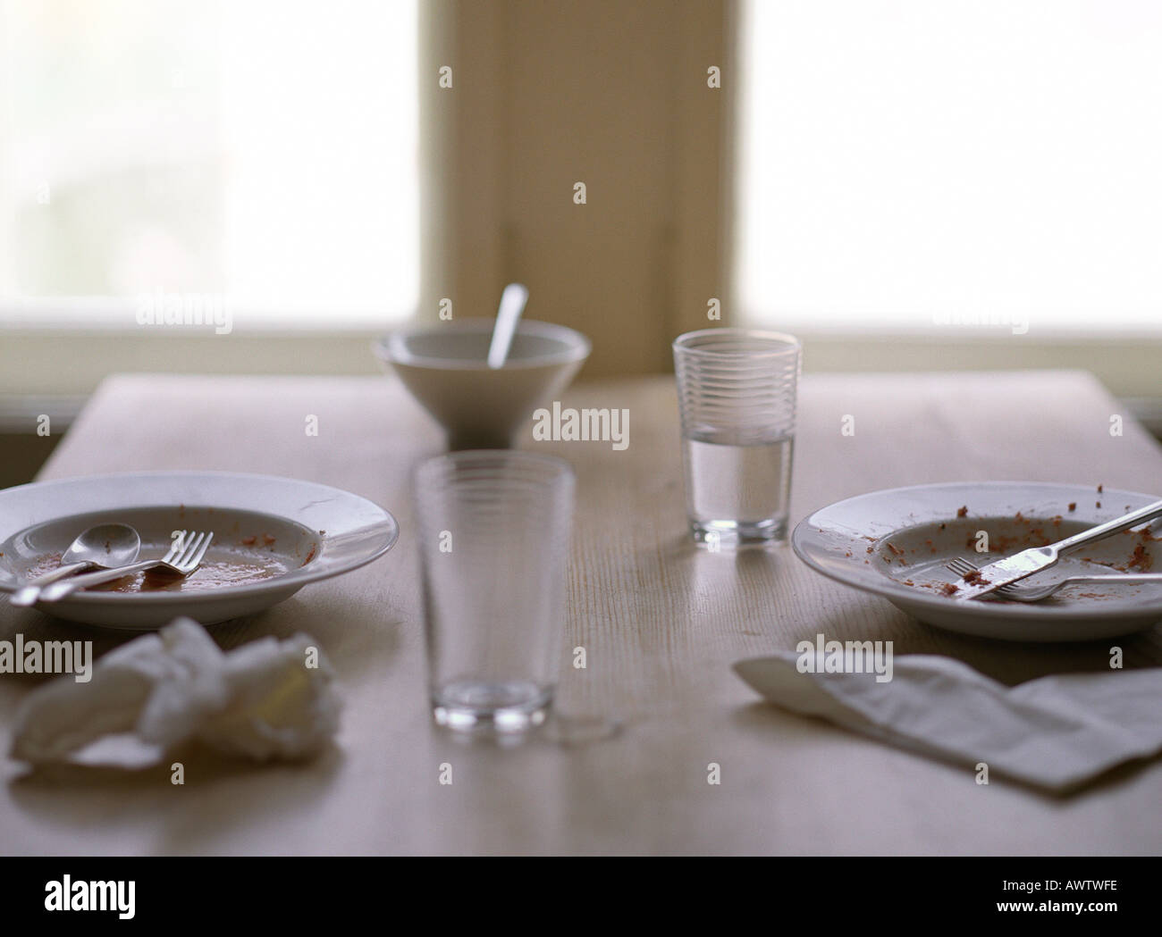 Table with dirty dishes Stock Photo - Alamy