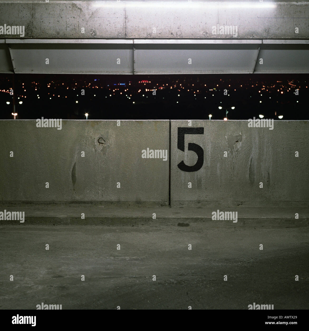 City lights seen through parking lot window Stock Photo - Alamy