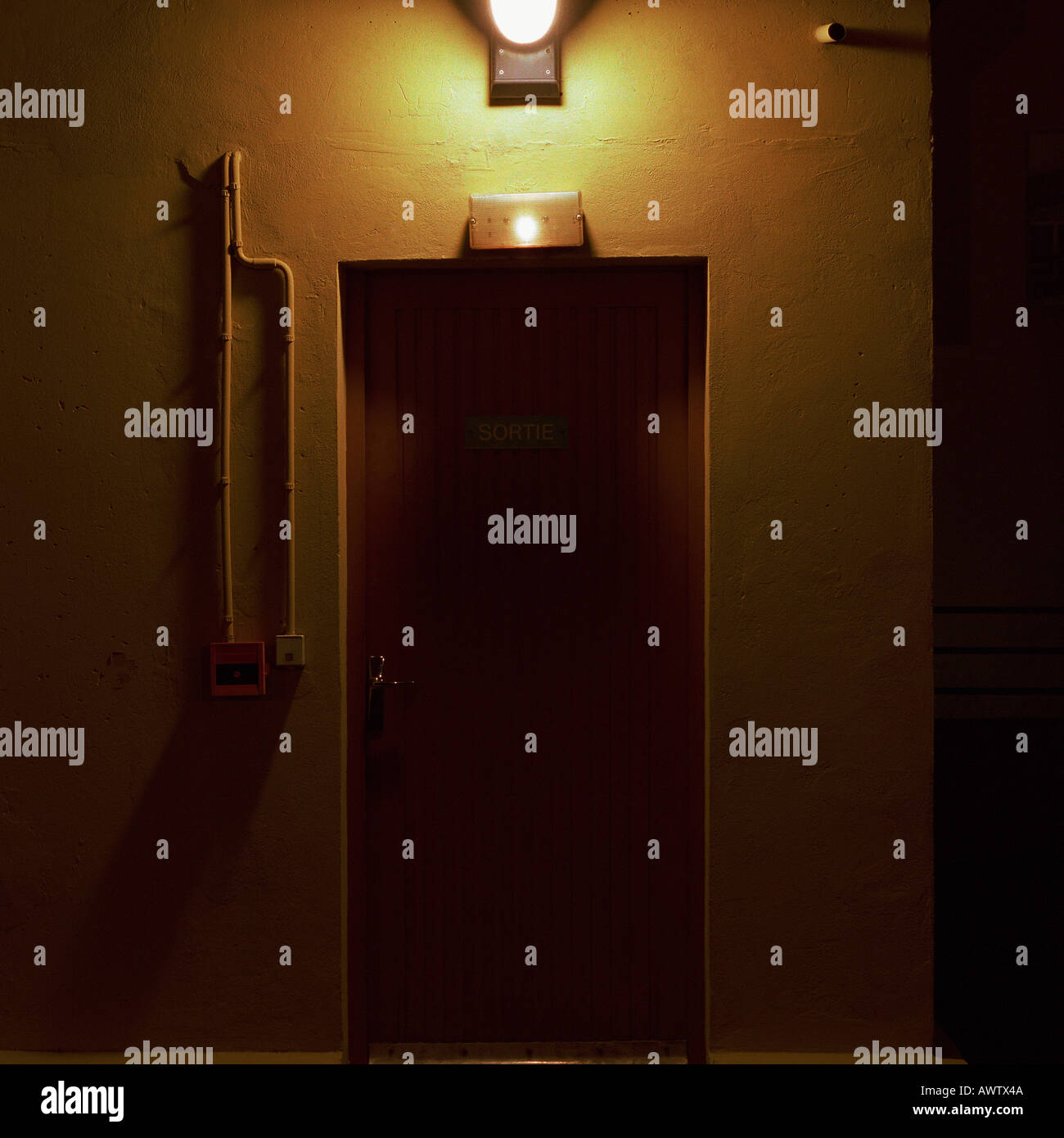 Light above doorway, night Stock Photo - Alamy