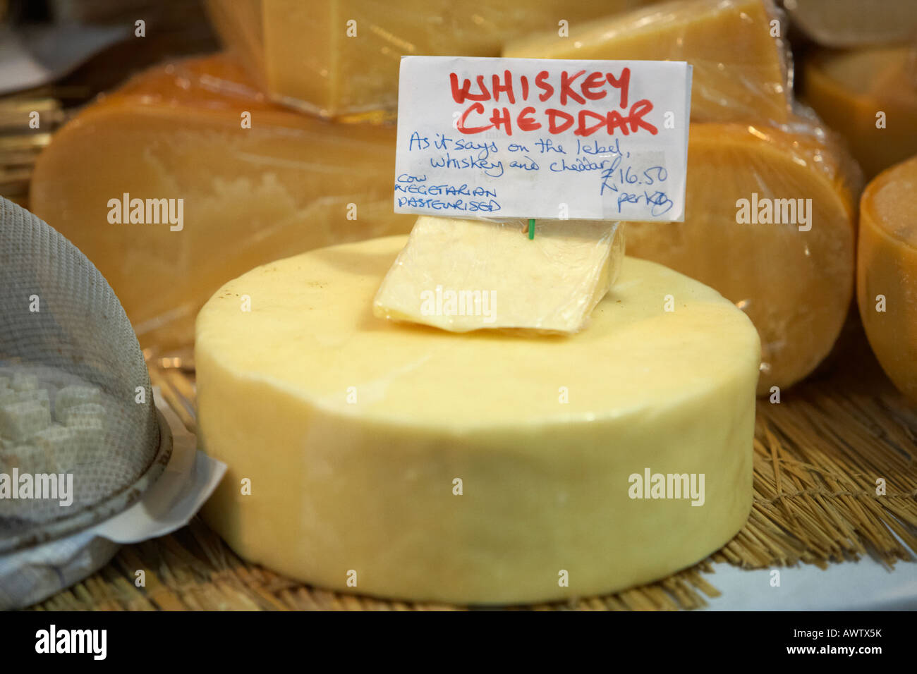 irish whiskey cheddar cheese selection at an indoor market Stock Photo ...