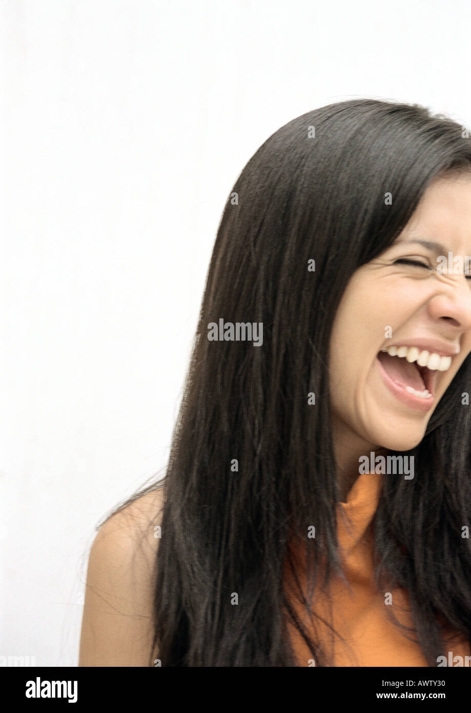 Woman laughing, eyes shut, partial view portrait Stock Photo - Alamy