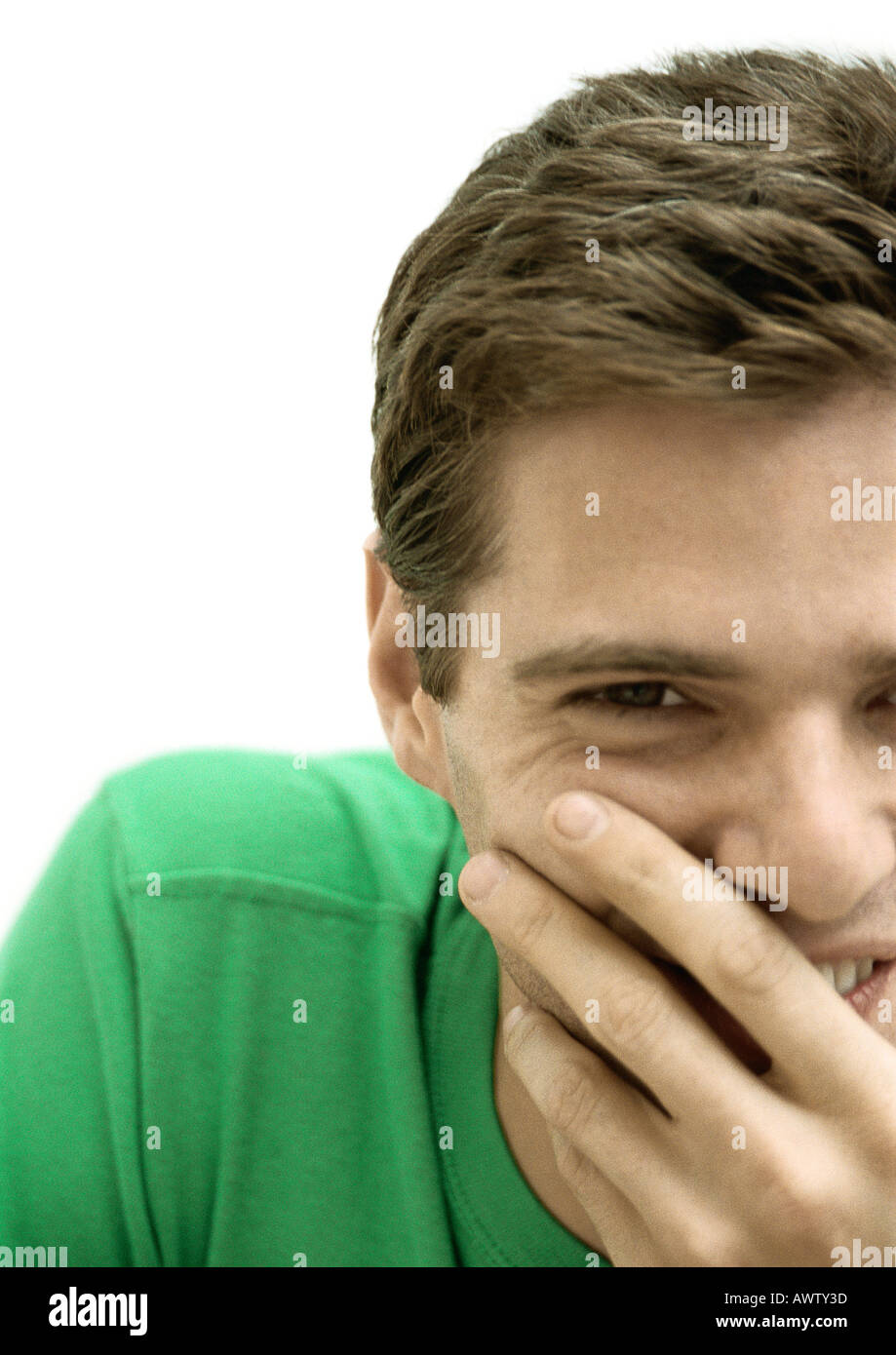 Man hand over mouth laughing hi-res stock photography and images - Alamy