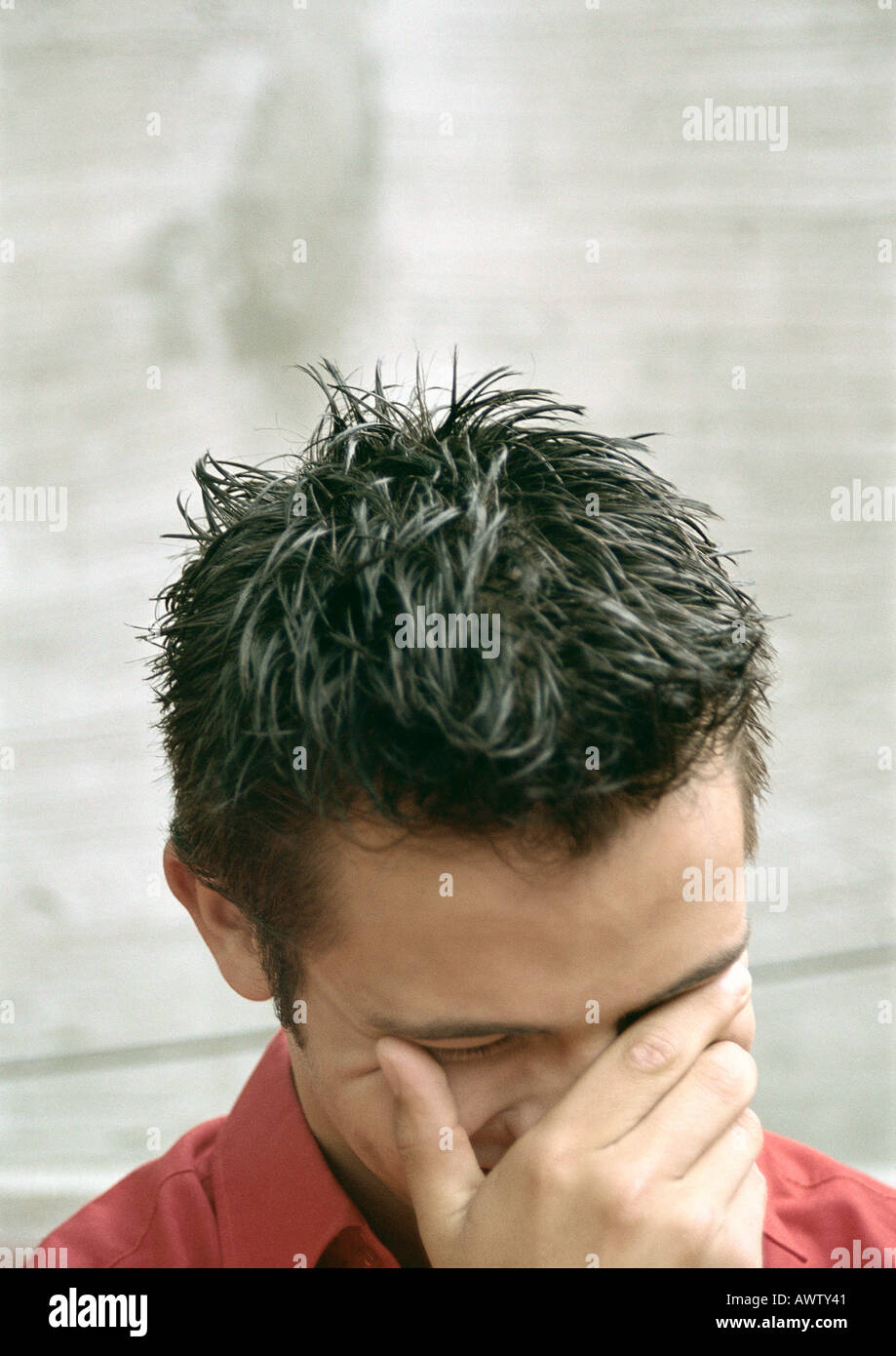Man covering face with hand, portrait Stock Photo - Alamy