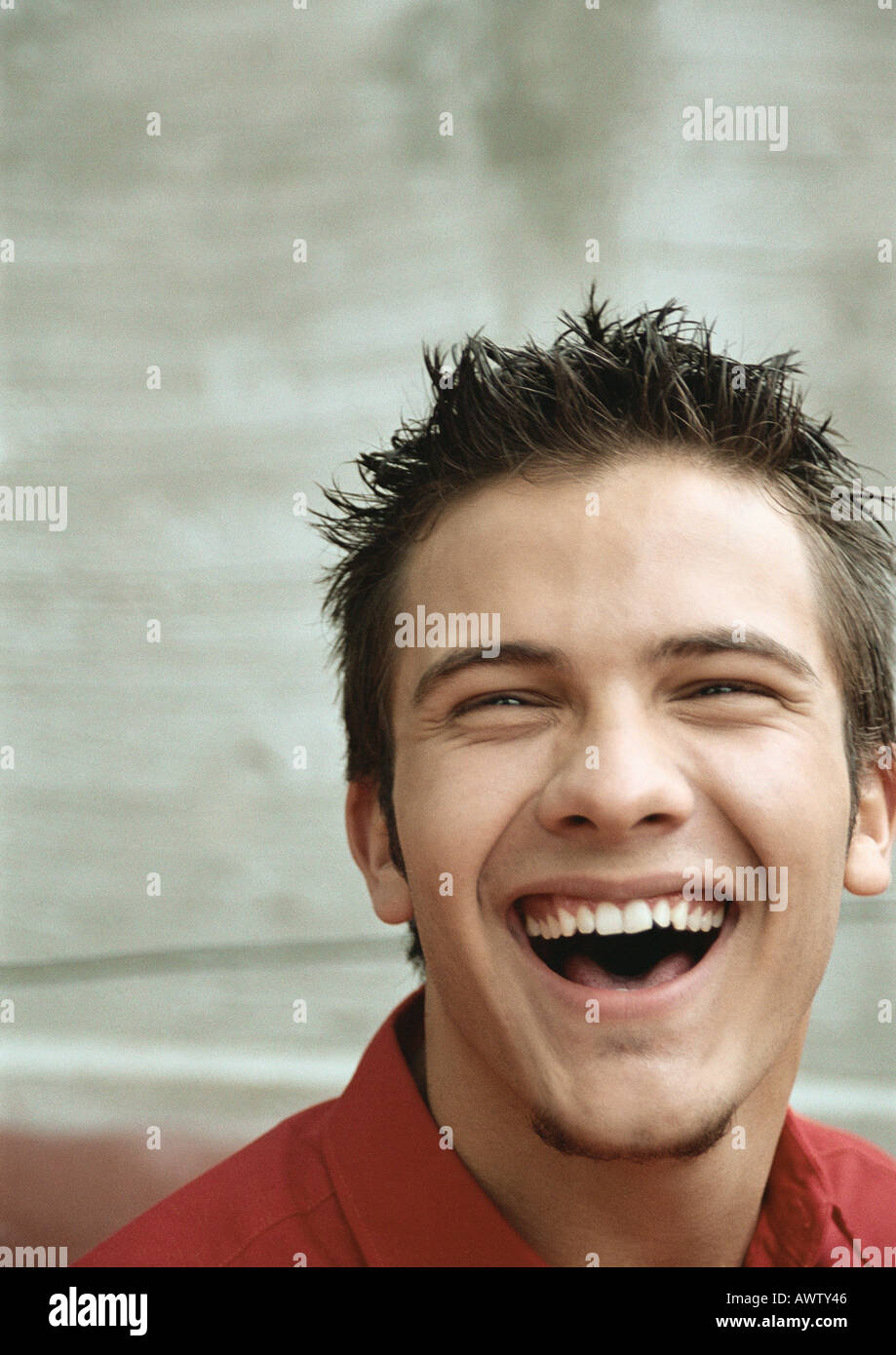 Teenage boy laughing, portrait Stock Photo - Alamy