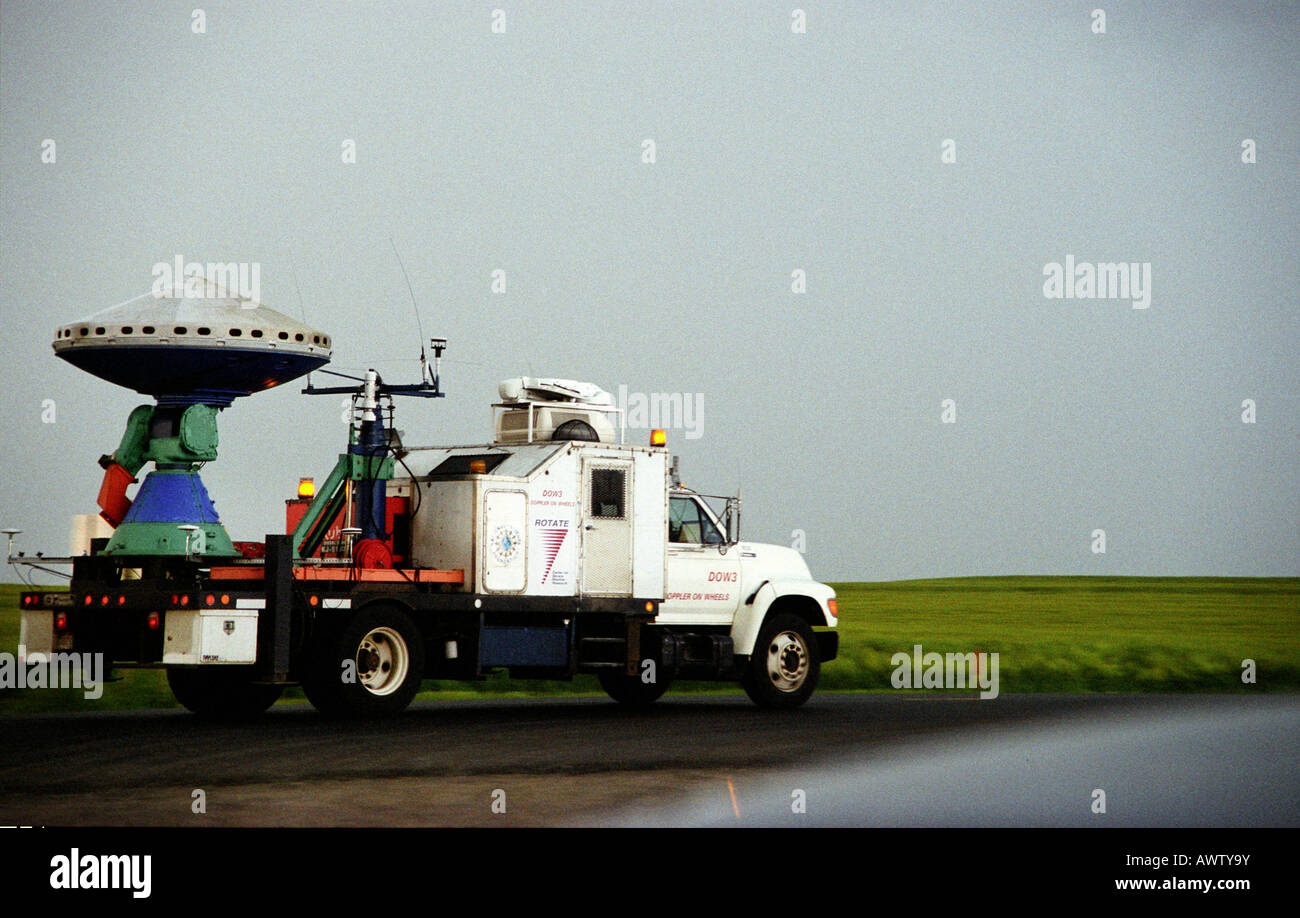 One of the three Doppler on Wheels trucks speeds by in rural Republic ...