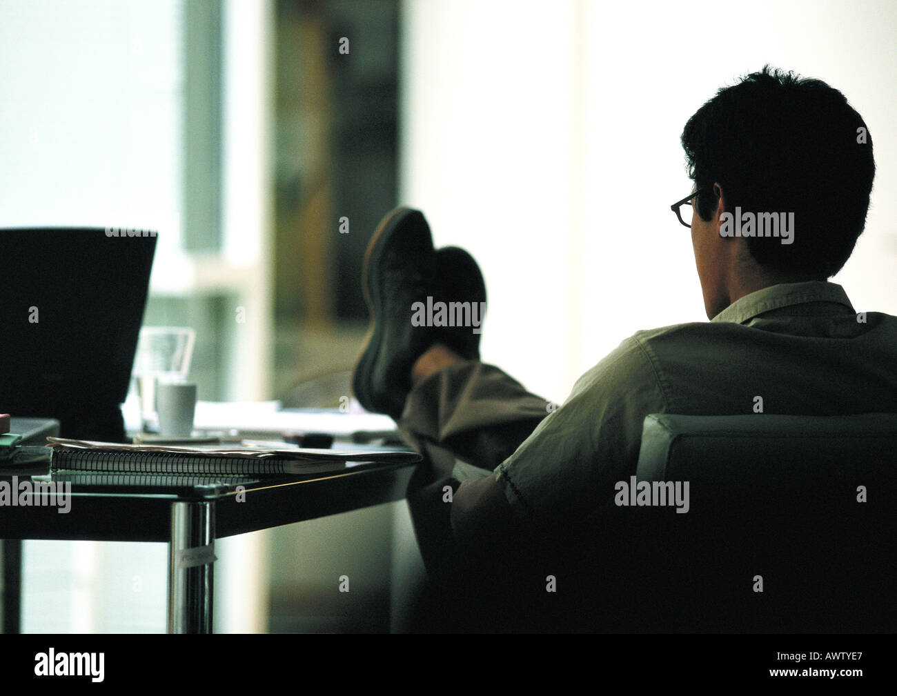 Feet On Desk High Resolution Stock Photography and Images - Alamy