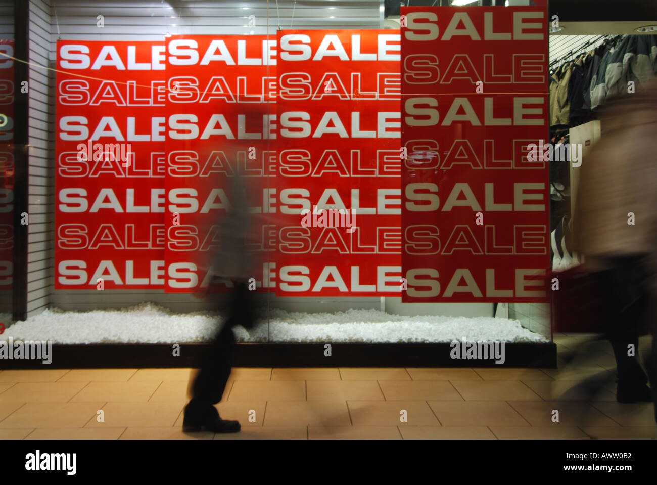 Indoor shopping complex shop window motion blur shopper customer ...