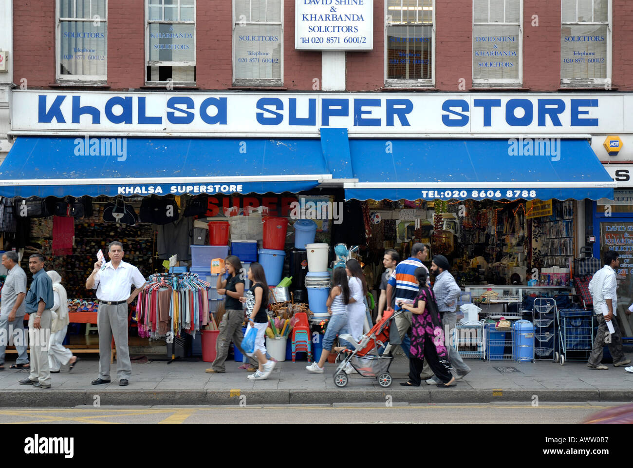 Street scene of people shopping in Southall Middlesex Stock Photo - Alamy