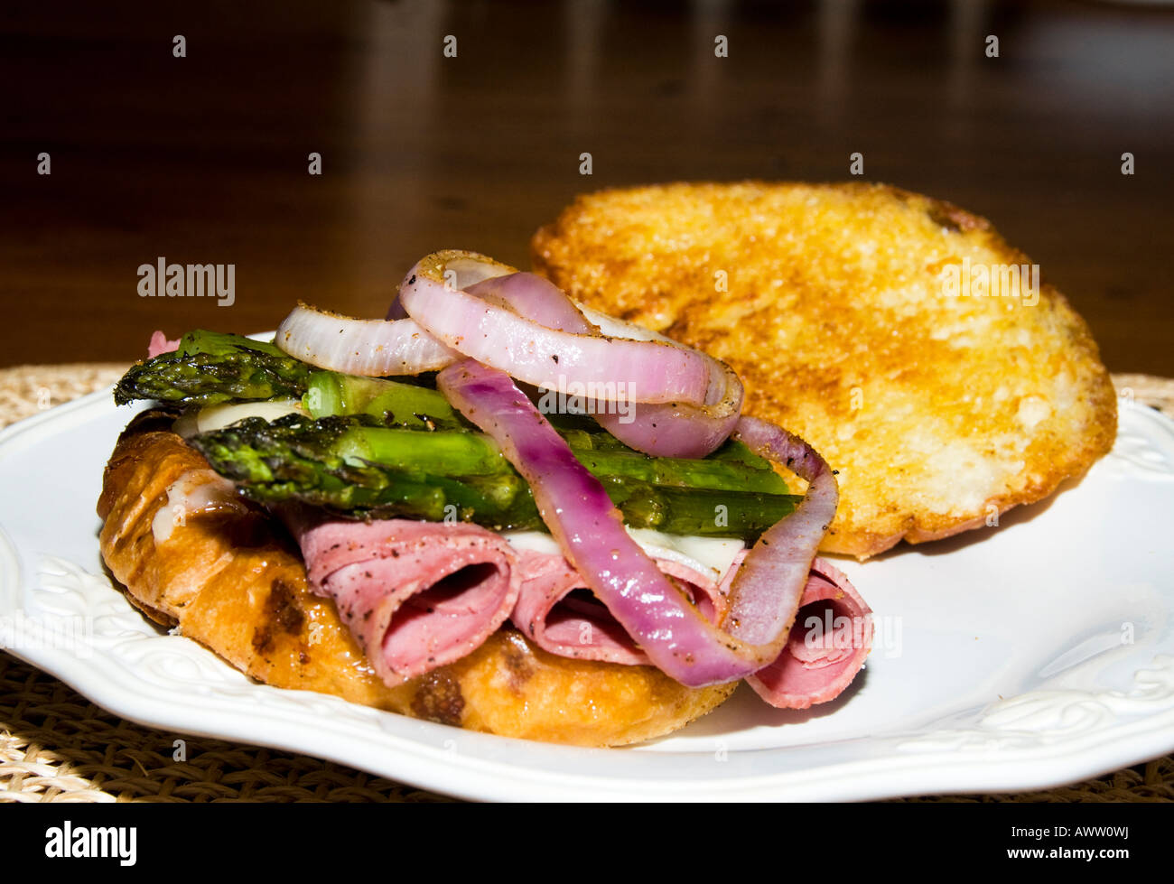 An Asiago cheese roll corned beef sandwich with asparagus. Oklahoma ...