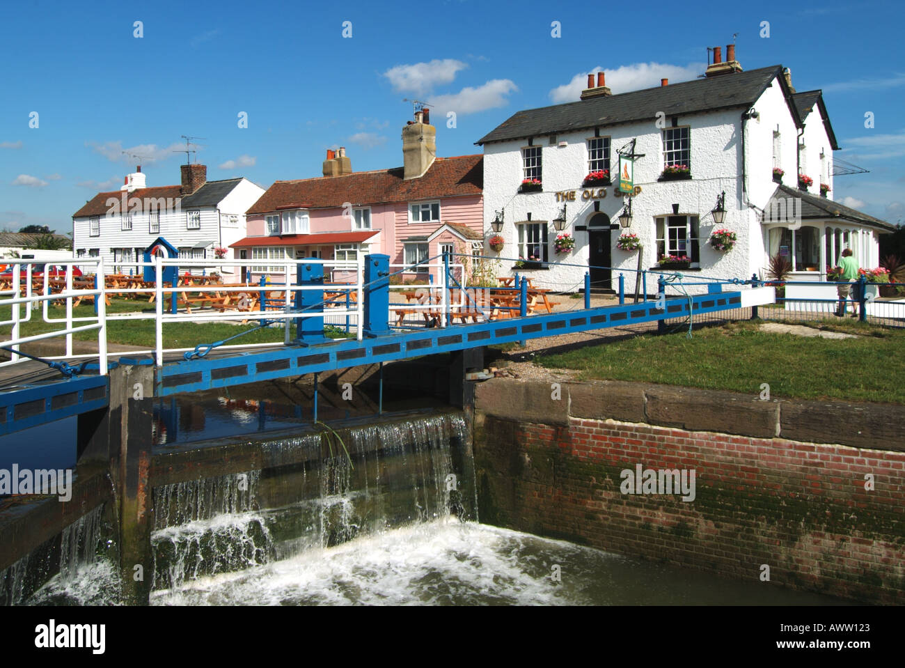 Old Ship Inn Heybridge Basin River Blackwater water spewing over lock ...