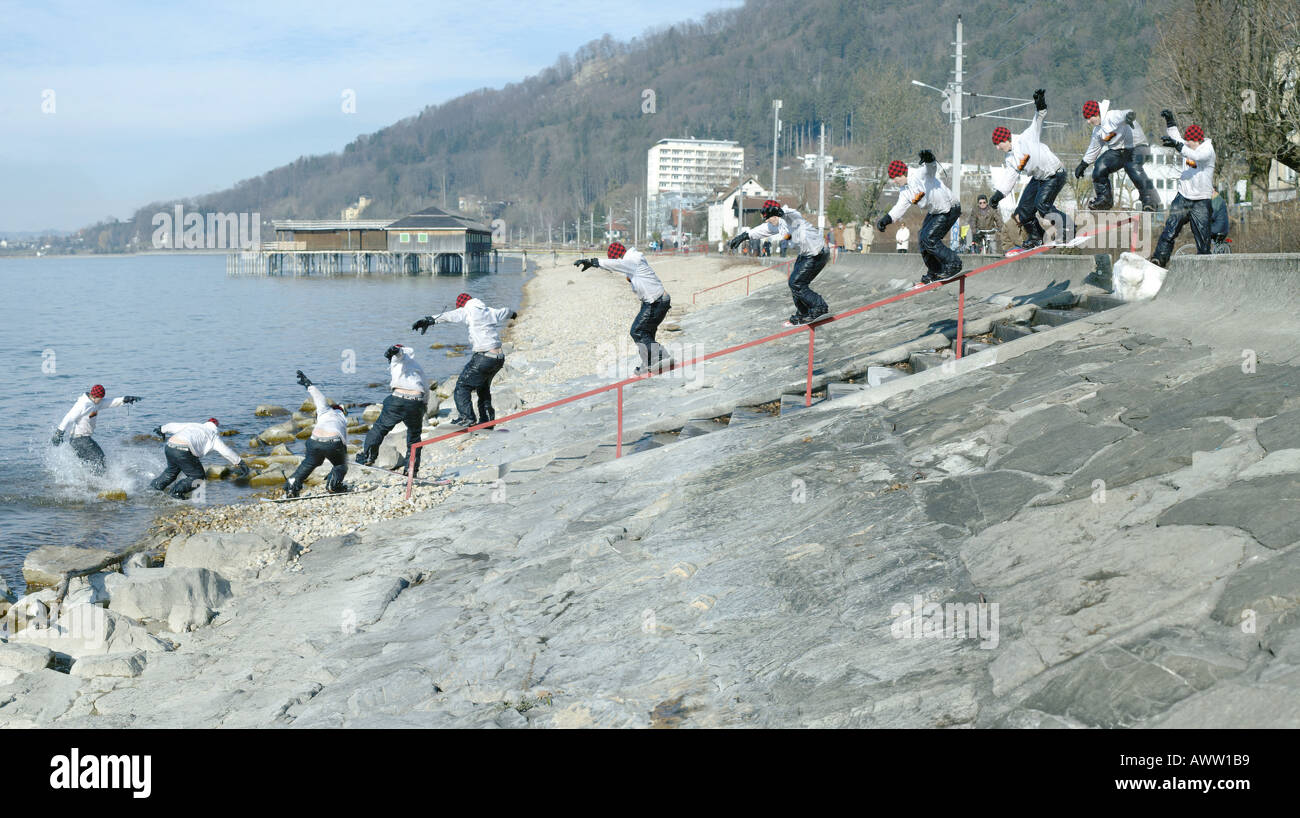 People balancing on railing Stock Photo - Alamy