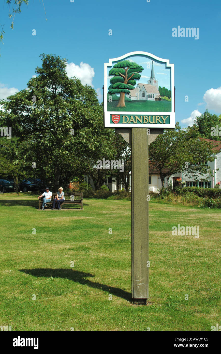 Danbury village sign with people resting on seat Essex England UK Stock ...
