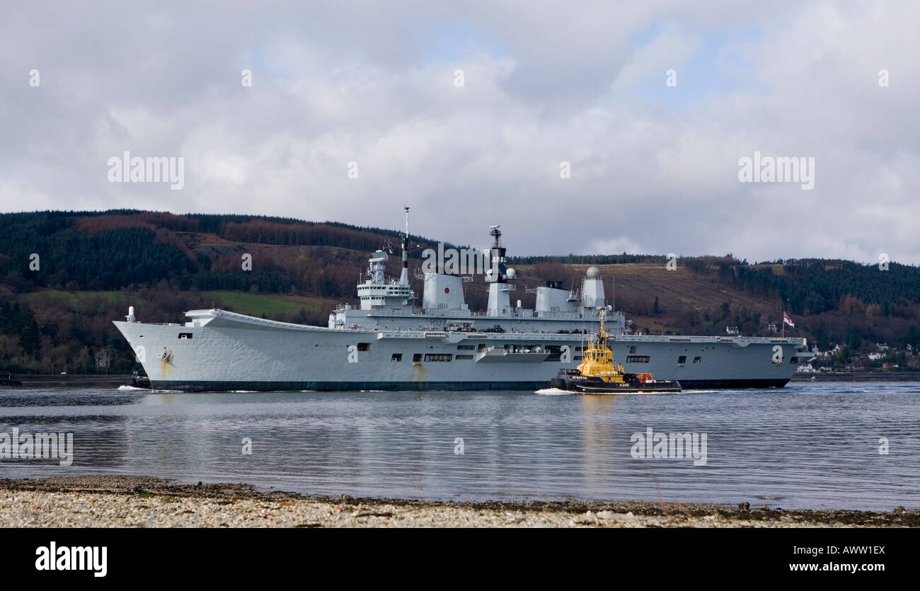 HMS Ark Royal leaves HMNB Clyde approaching Rhu narrows Stock Photo - Alamy