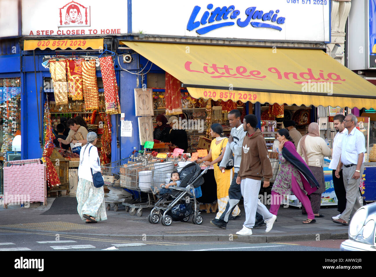 Street scene of people shopping in Southall Middlesex Stock Photo - Alamy