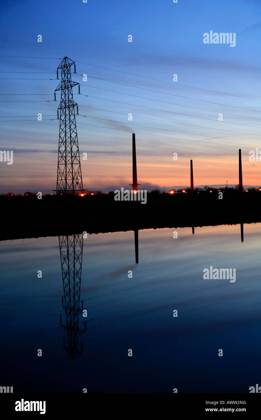 Sunset over Electricity Distribution Pylons Brick Chimneys ...