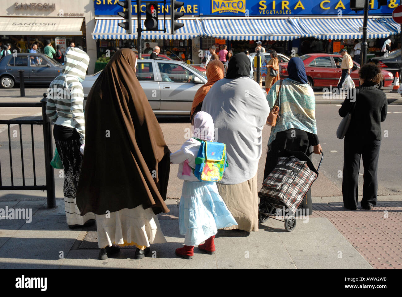 Street scene of people shopping in Southall Middlesex Stock Photo - Alamy